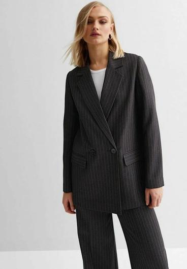 Básicos elegantes oversize y los trucos que mejor funcionan